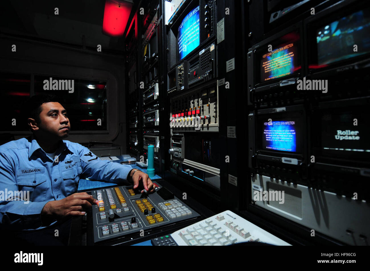 Petty Officer 3rd Class Michael Tialemasunu performs a daily ...