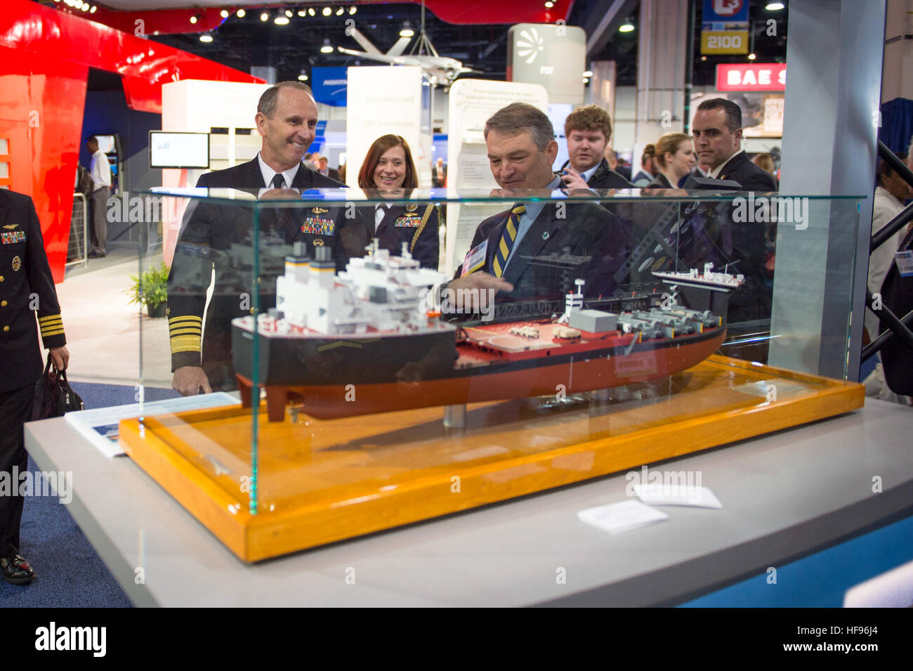 Chief of Naval Operations examines a scale model of a mobile landing ...