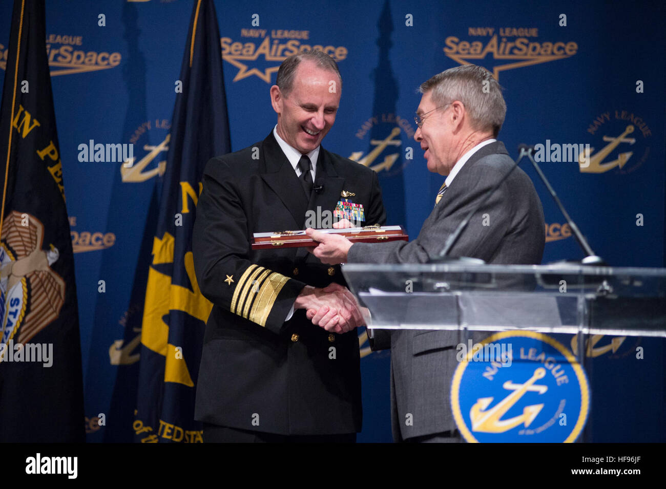 Chief of Naval Operations Adm. Jonathan Greenert receives a gift from U ...