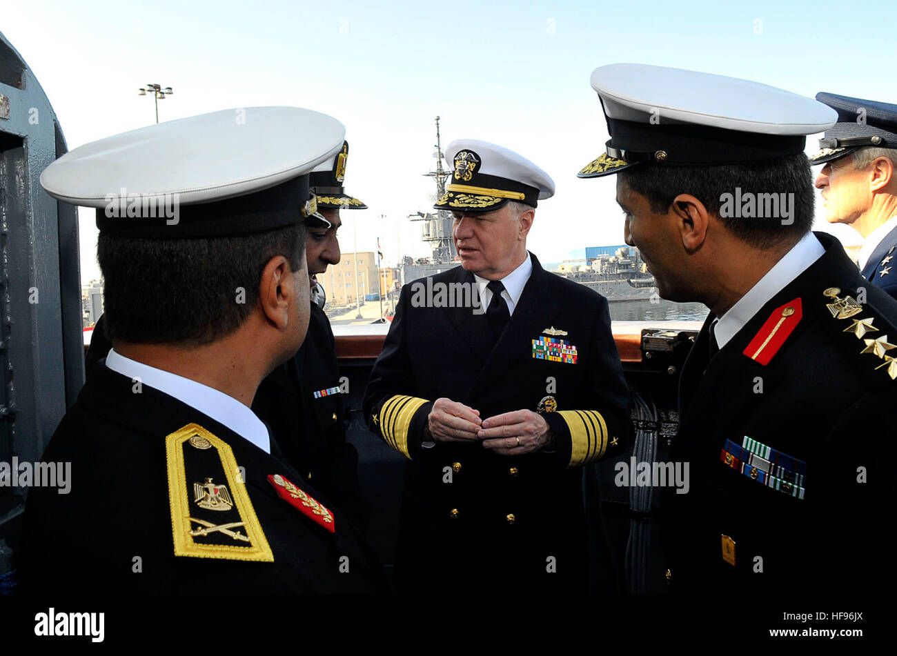 Chief of Naval Operations Adm. Gary Roughead, middle, speaks with the ...