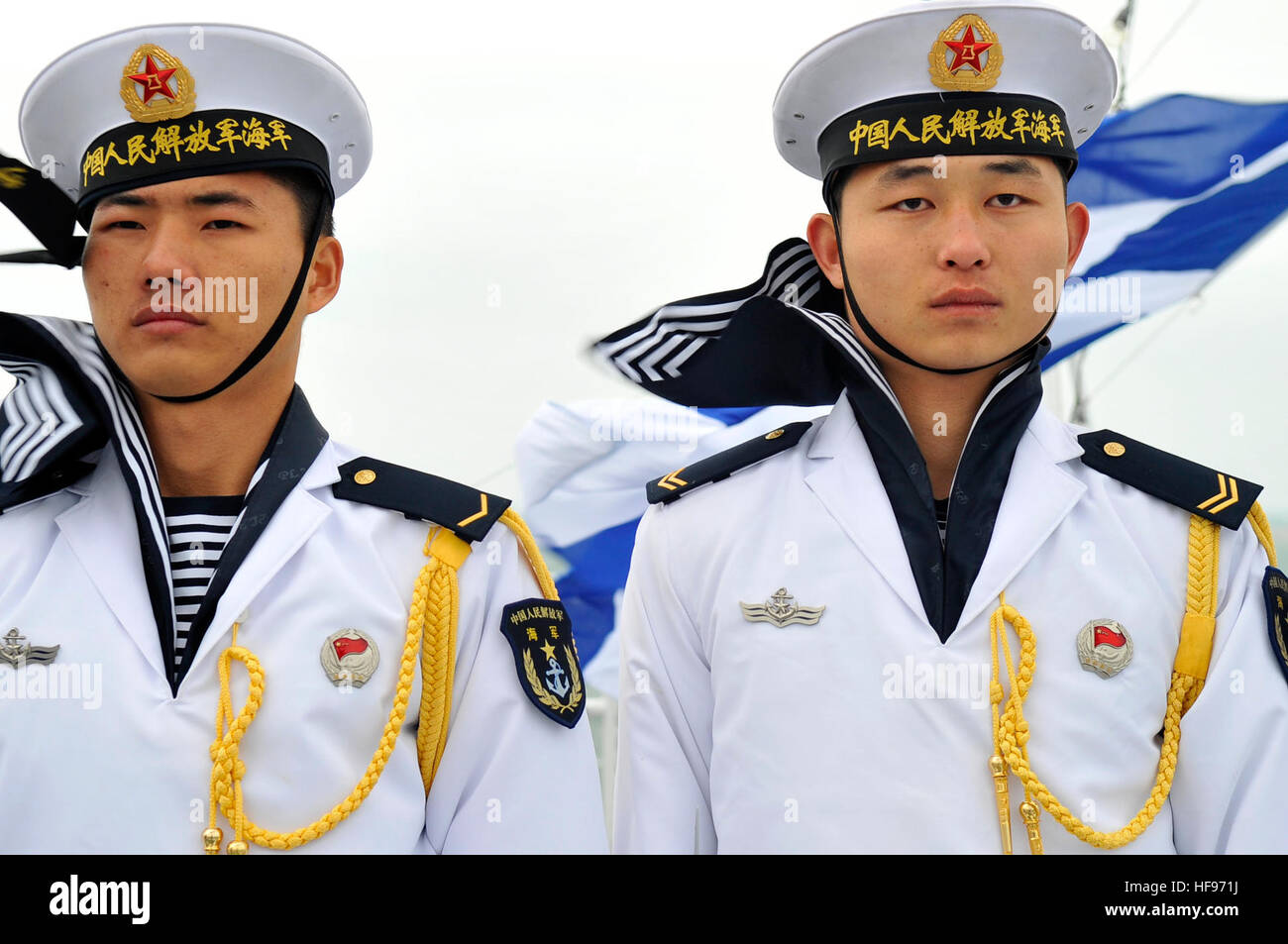 People's Liberation Army (PLA) Navy sailors stand at attention aboard ...