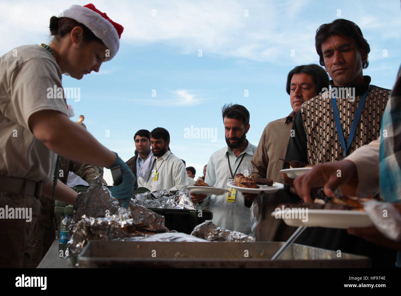 U.S. Navy and Army personnel serving with PRT Farah conduct a community ...
