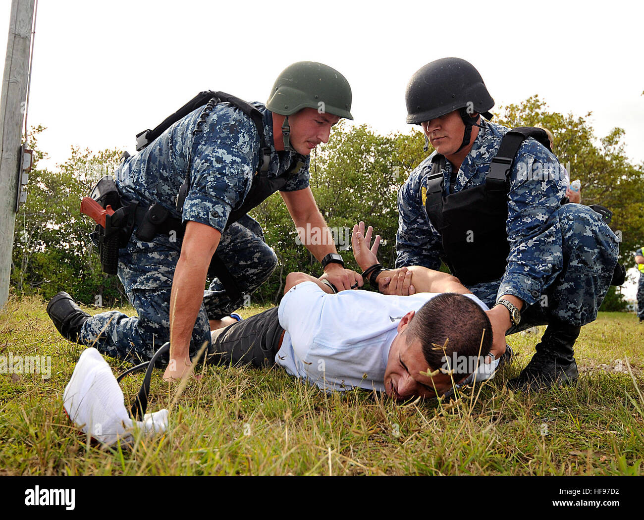 Master-at-Arms 2nd Class Jeremy Redfern (left), of Medina, Tennessee ...