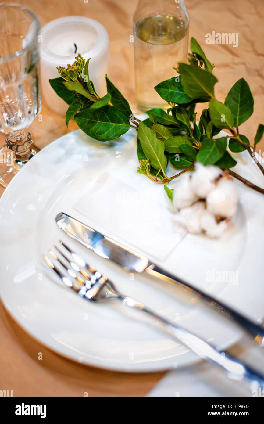Decorated table ready for dinner. Beautifully decorated table set with ...