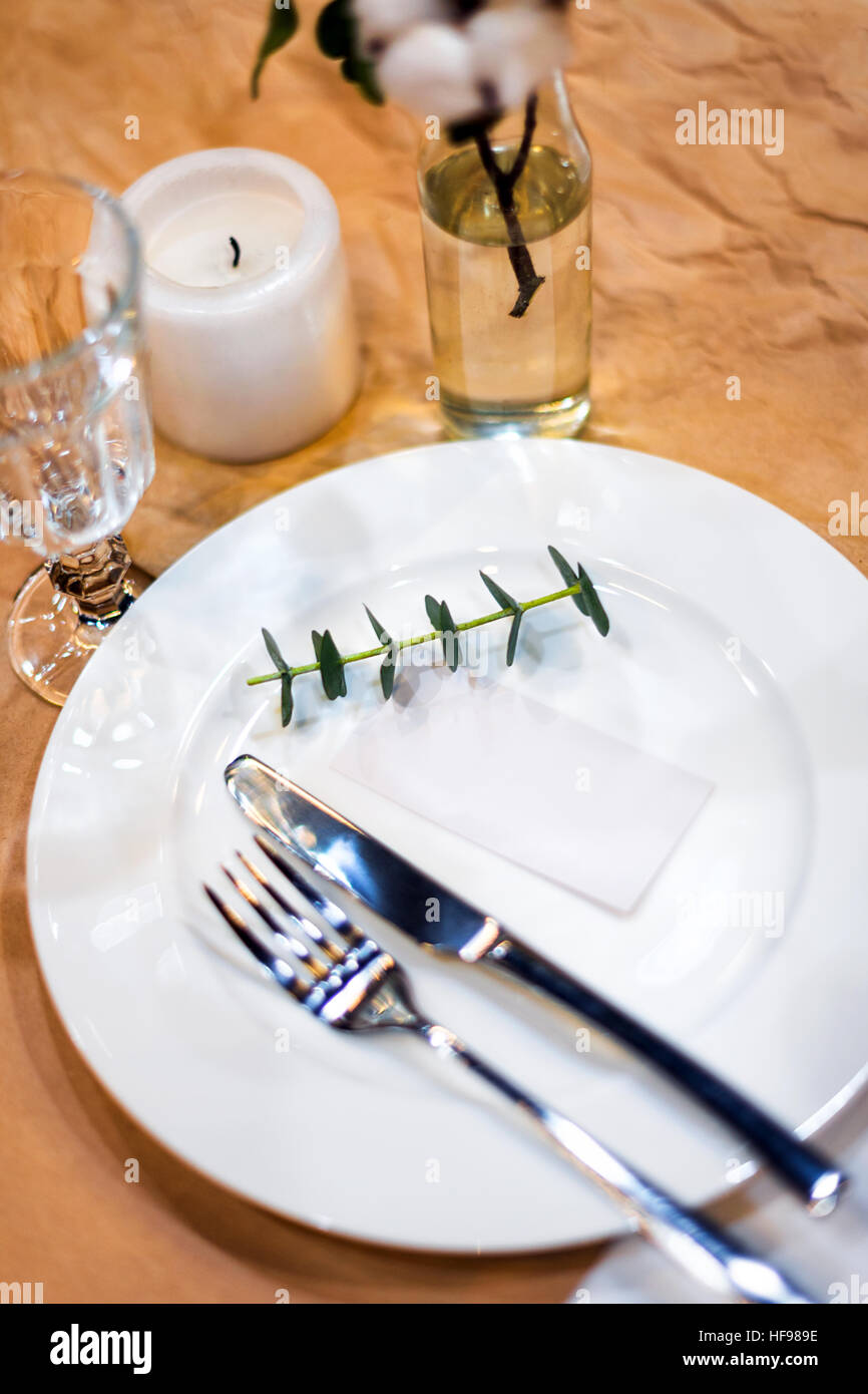 Decorated table ready for dinner. Beautifully decorated table set with ...
