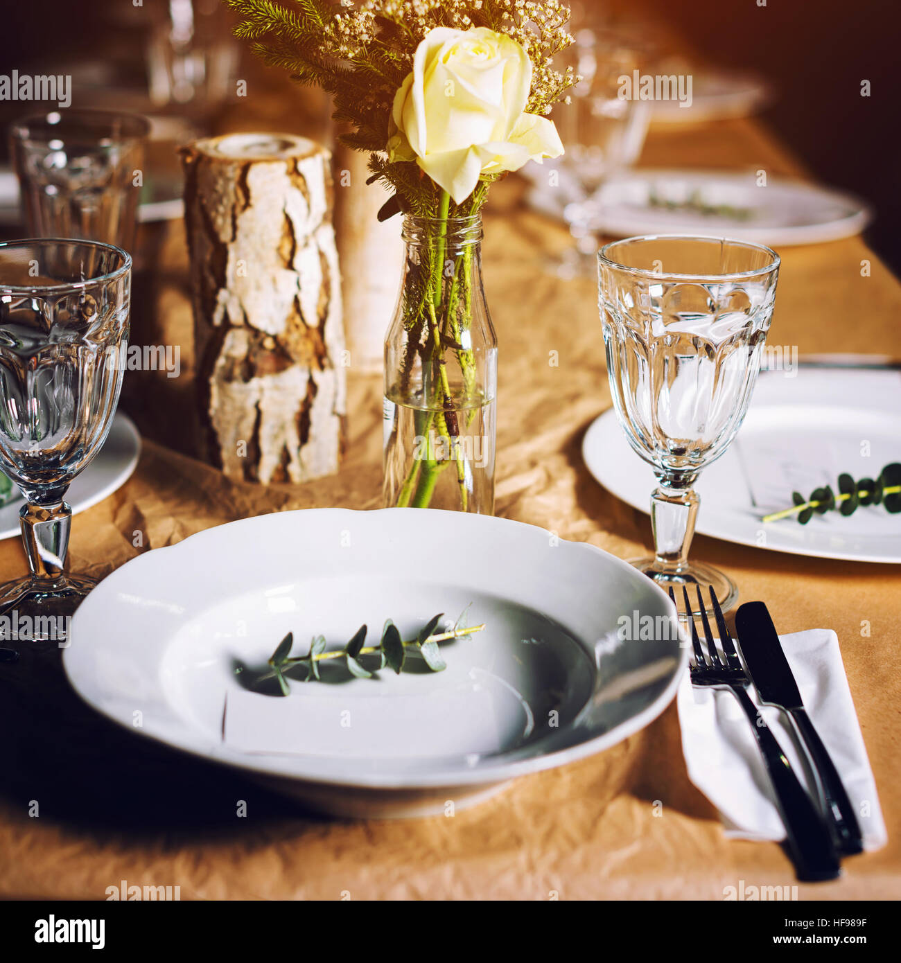 Decorated table ready for dinner. Beautifully decorated table set with ...