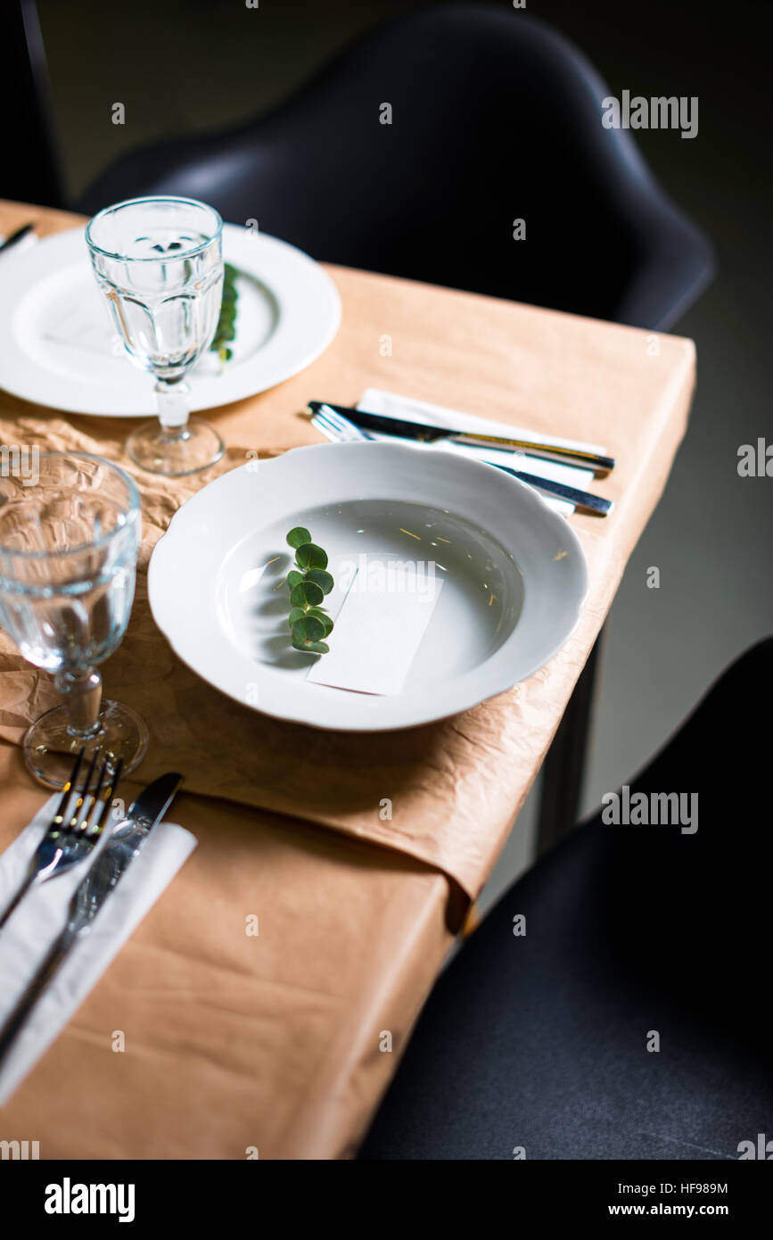 Decorated table ready for dinner. Beautifully decorated table set with ...
