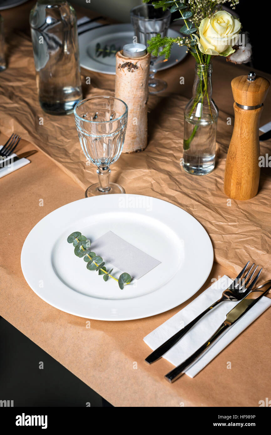 Decorated table ready for dinner. Beautifully decorated table set with ...