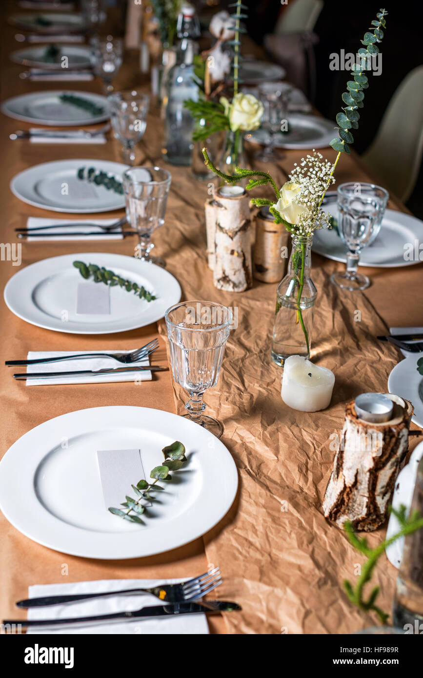 Decorated table ready for dinner. Beautifully decorated table set with ...