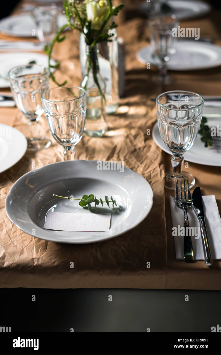 Decorated table ready for dinner. Beautifully decorated table set with ...