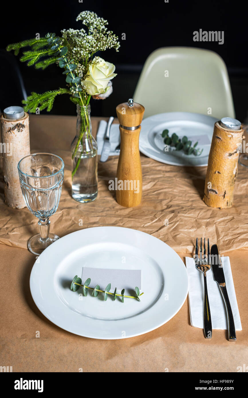 Decorated table ready for dinner. Beautifully decorated table set with ...