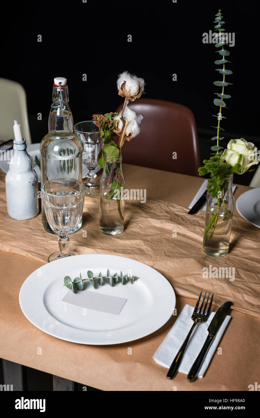 Decorated table ready for dinner. Beautifully decorated table set with ...