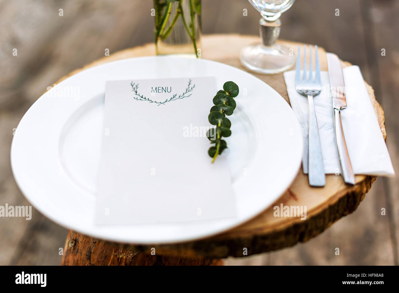Paper menu on decorated table ready for dinner. Beautifully decorated ...