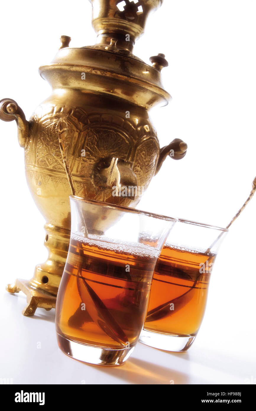 Two glasses of tea in front of a samovar Stock Photo - Alamy