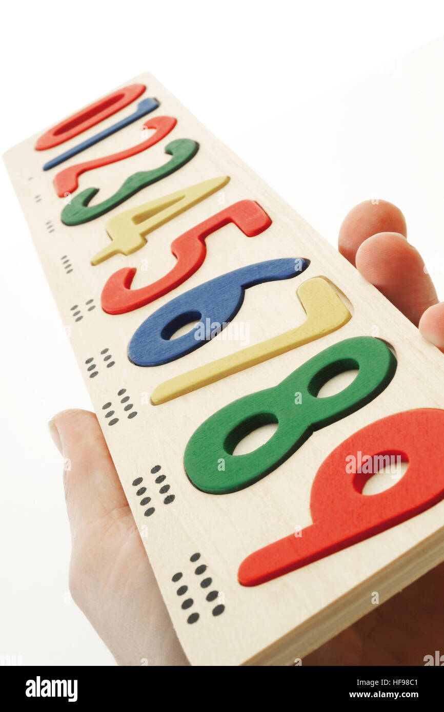 Hand holding a number board Stock Photo - Alamy