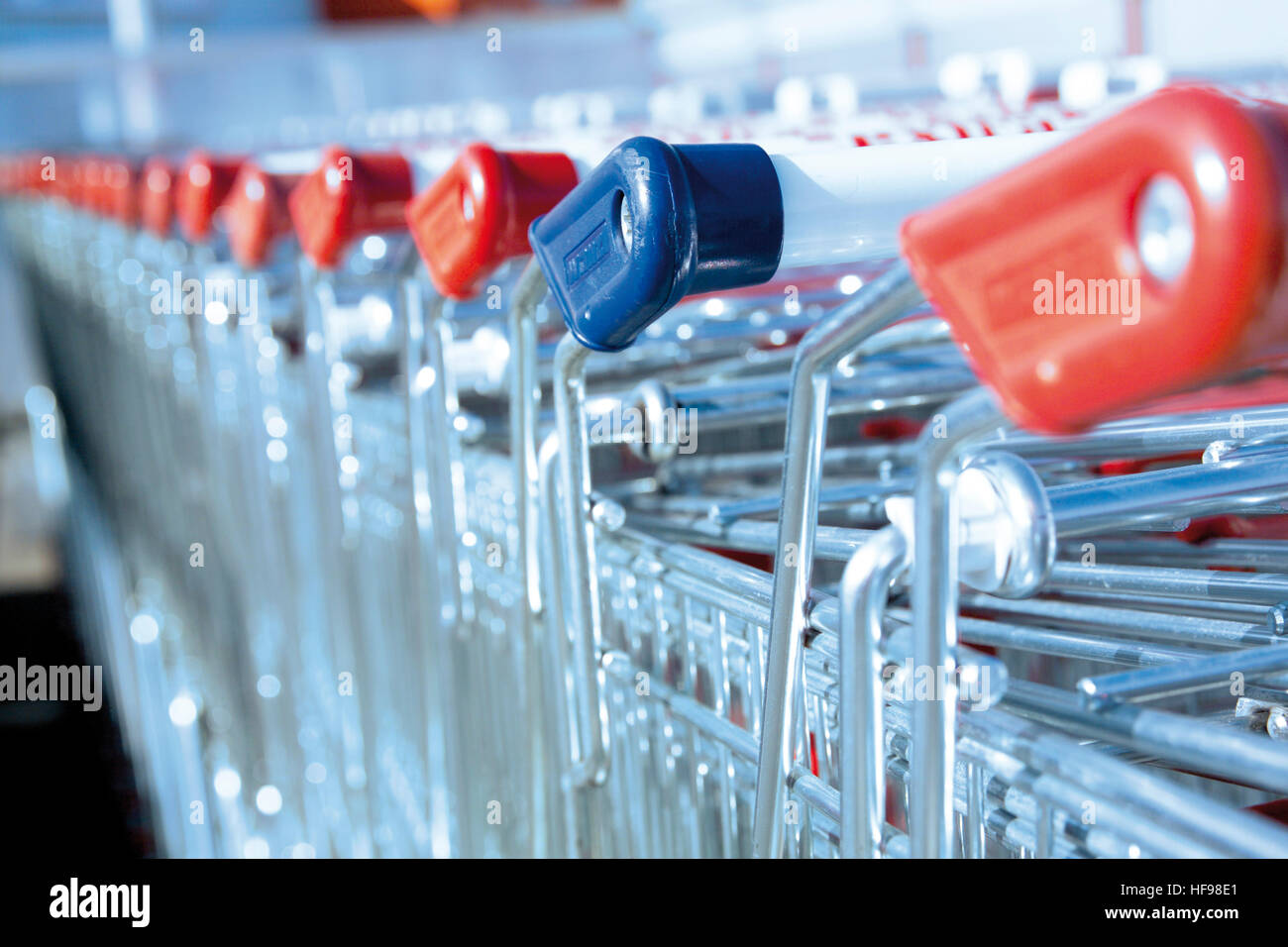 Stacked shopping carts Stock Photo - Alamy