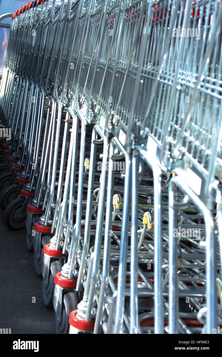 Stacked shopping carts Stock Photo - Alamy