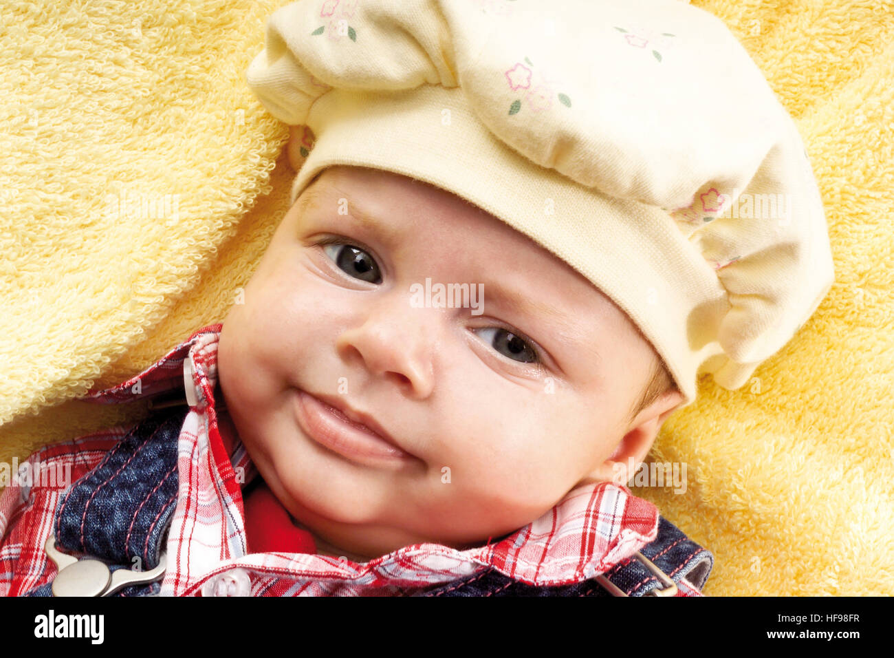 Baby wearing a hat Stock Photo - Alamy