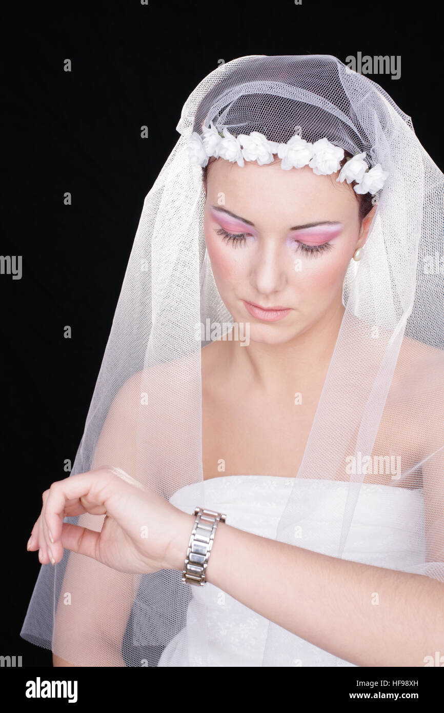 Woman gazing at clock hi-res stock photography and images - Alamy