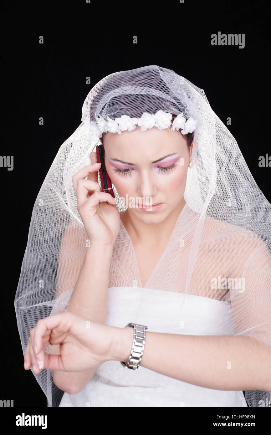 Woman gazing at clock hi-res stock photography and images - Alamy