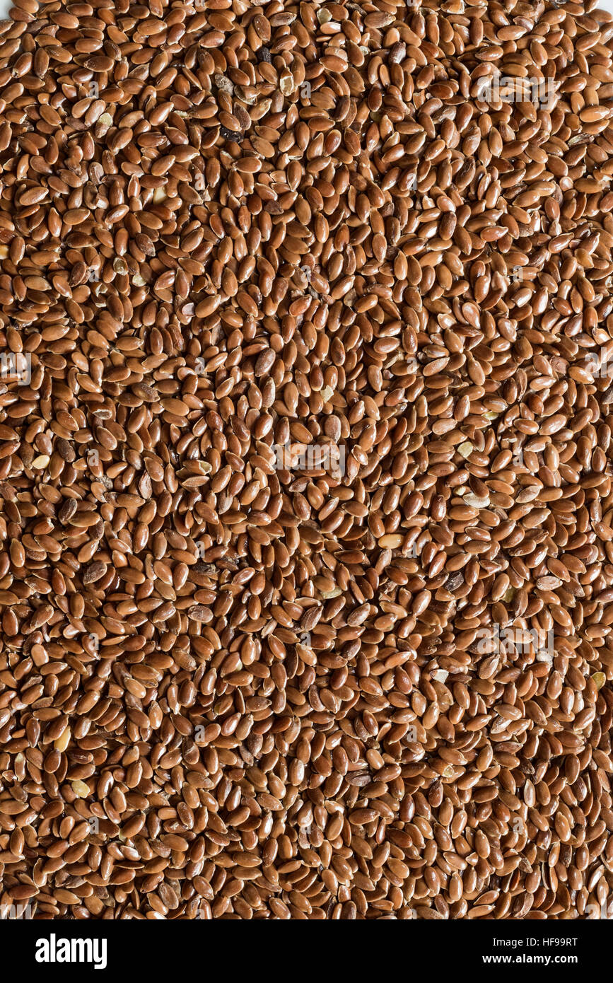 flax seeds grouped together to form a background Stock Photo - Alamy