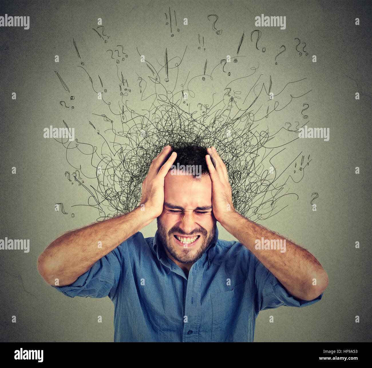 Stressed man upset frustrated has too many thoughts with brain melting ...