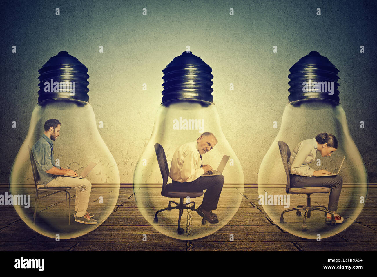 Side profile company employees sitting in row inside electric lamp ...