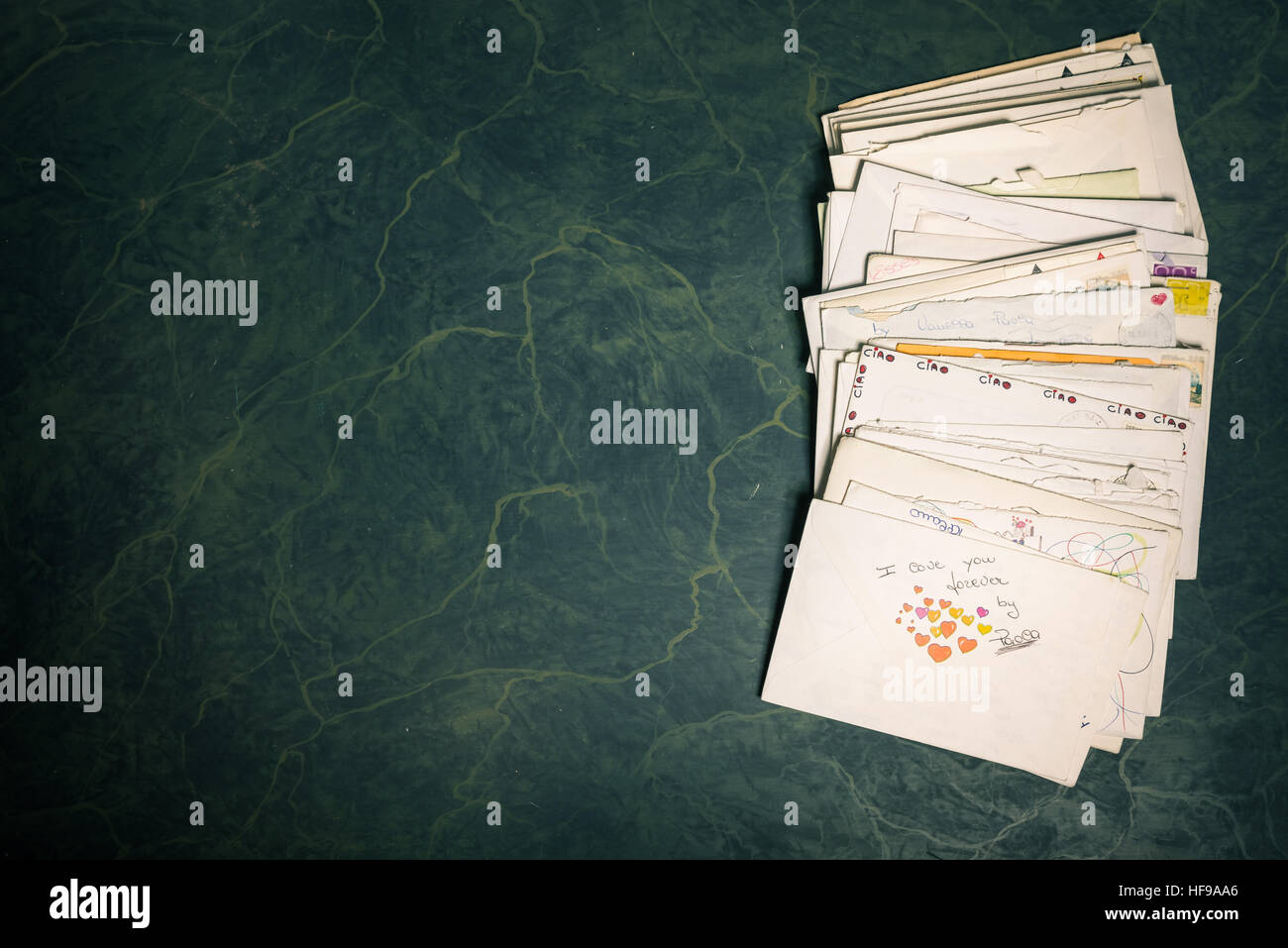 Big stack of mails, pile of papers, or heap of letters, above a letter ...