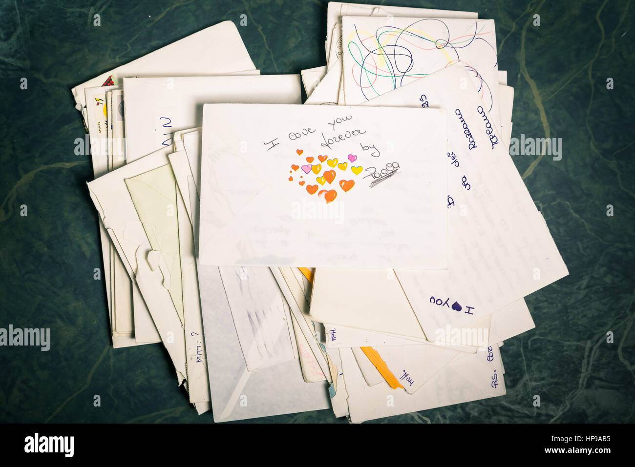 Big stack of mails, pile of papers, or heap of letters, above a letter ...