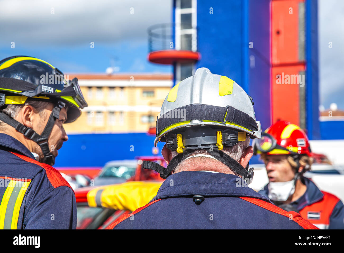 firemen during a car accident simulation Stock Photo - Alamy