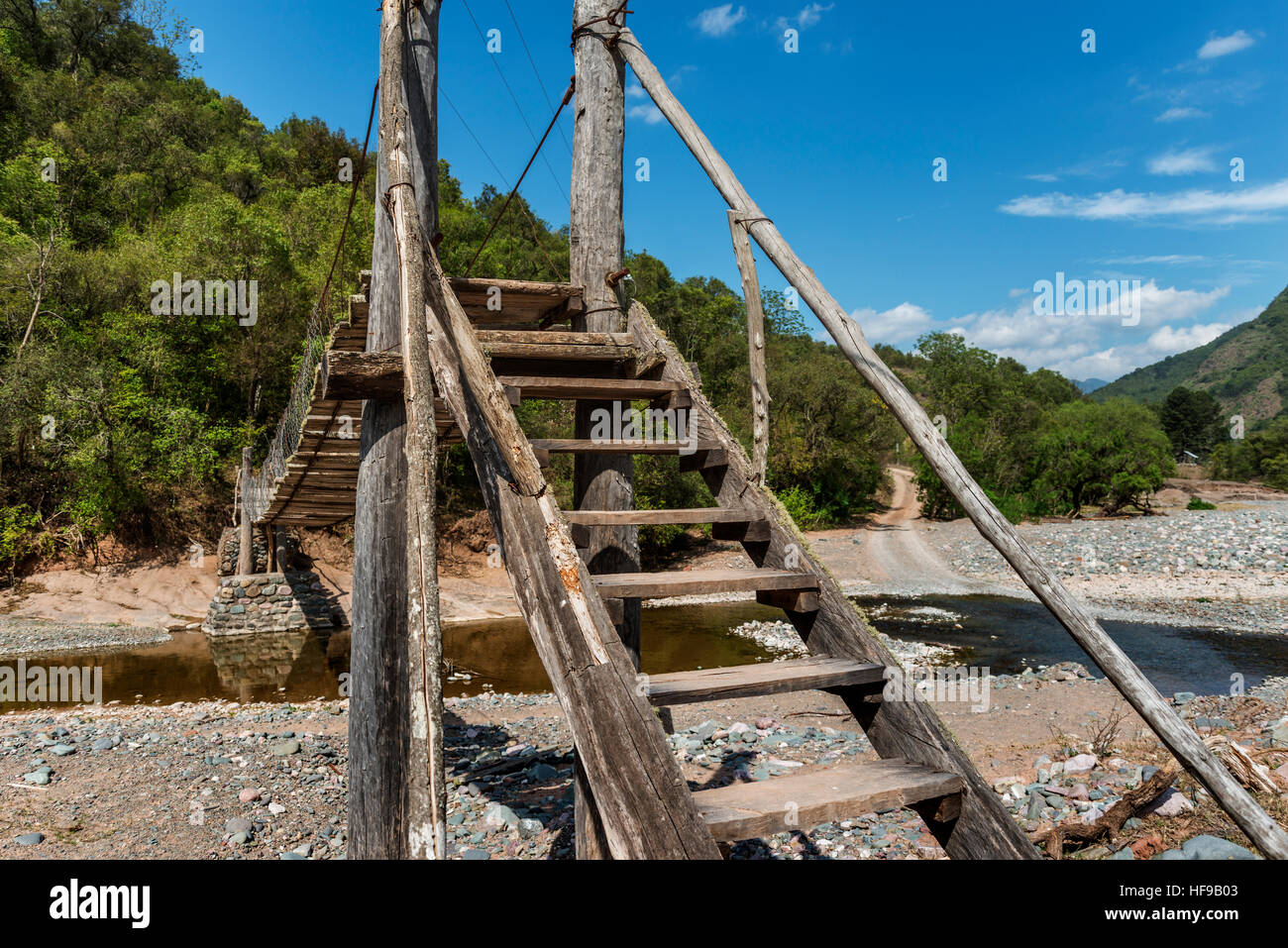Hanging wooden bridge over river in the Latin American jungle Stock ...