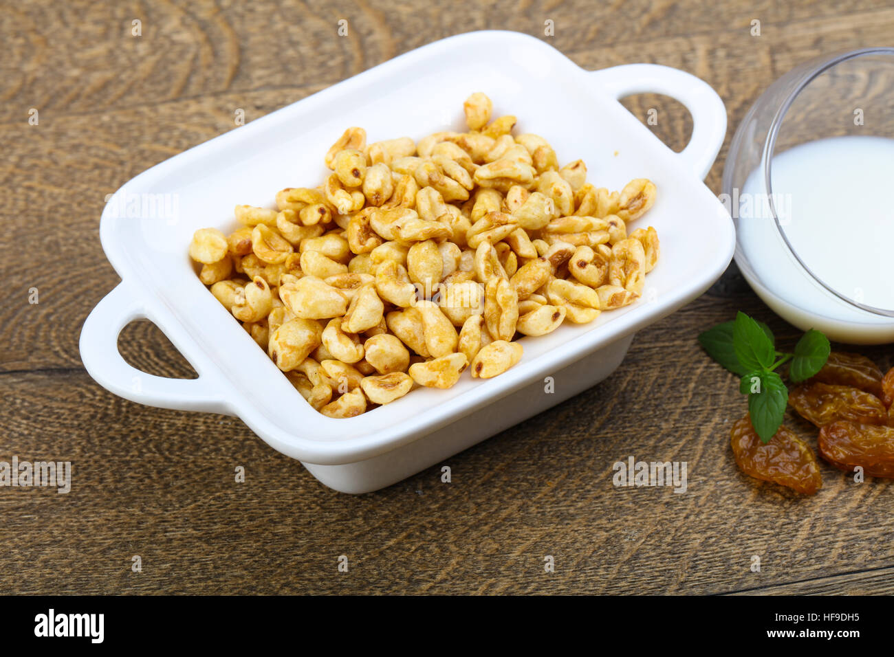 Rise flakes with milk, raisin and mint leaves Stock Photo - Alamy