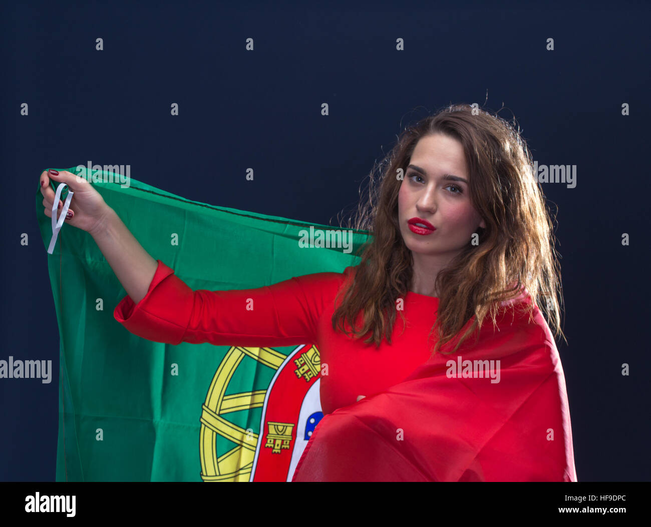 Beautiful brunette woman with Flag of Portugal. Toned image Stock Photo ...