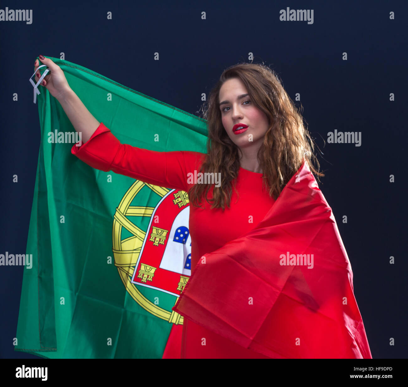 Beautiful brunette woman with Flag of Portugal. Toned image Stock Photo ...