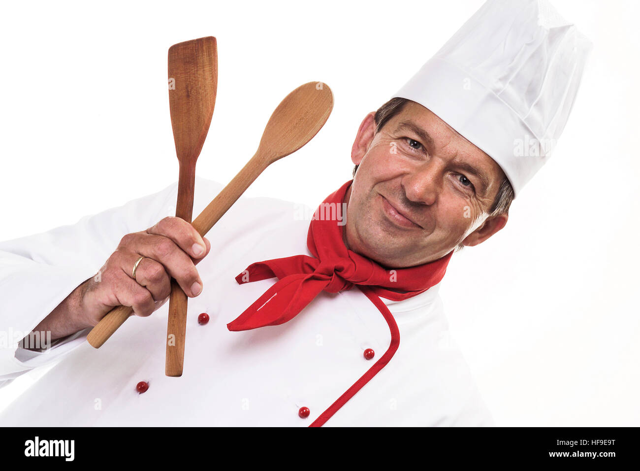 Chef holding wooden spoons Stock Photo - Alamy