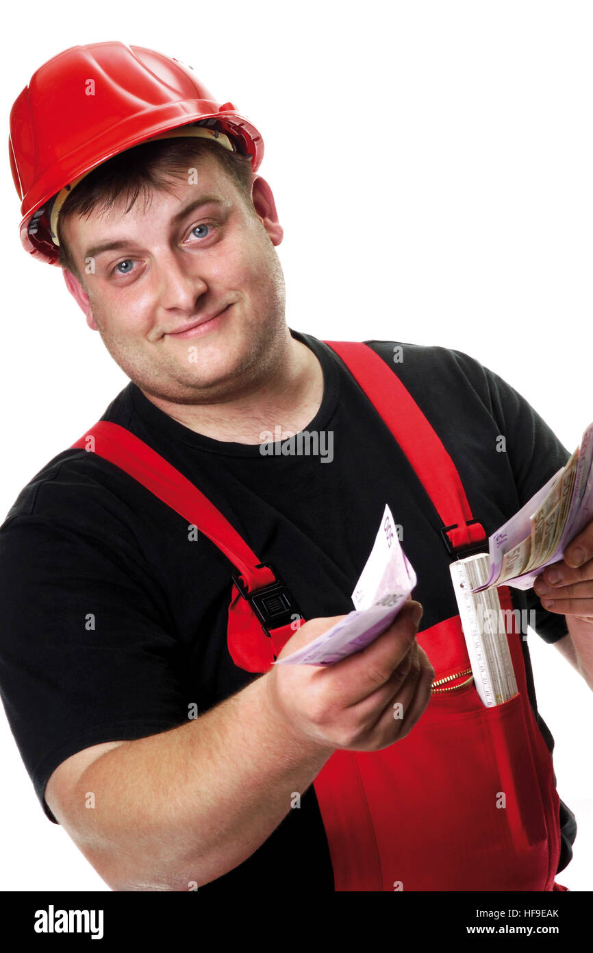 Construction worker wearing red hardhat getting paid Stock Photo - Alamy