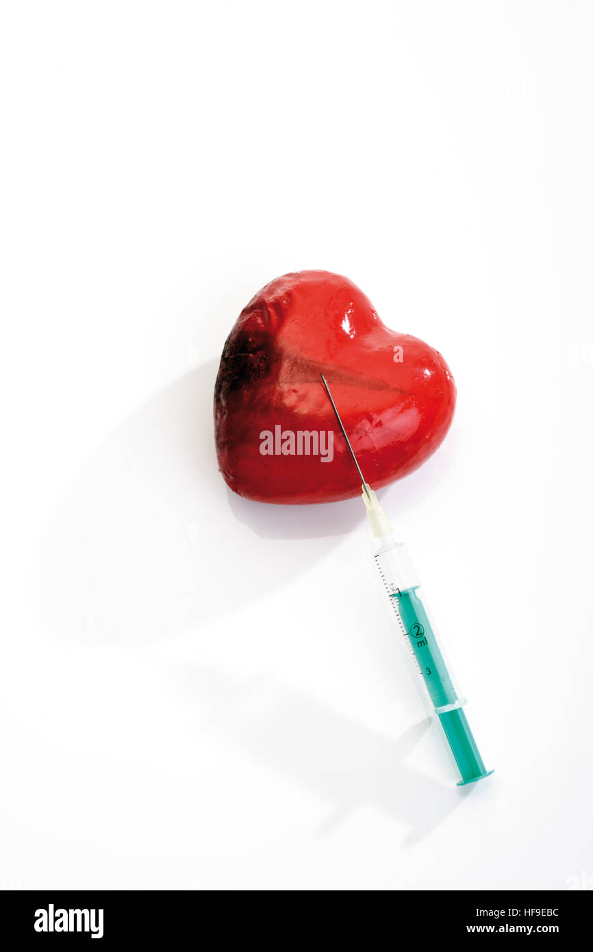 Heart and syringe Stock Photo - Alamy