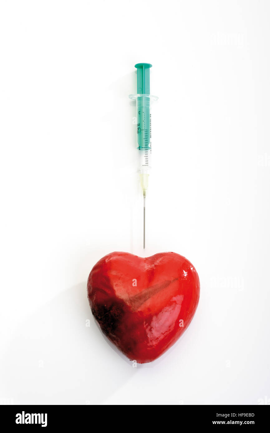 Heart and syringe Stock Photo - Alamy