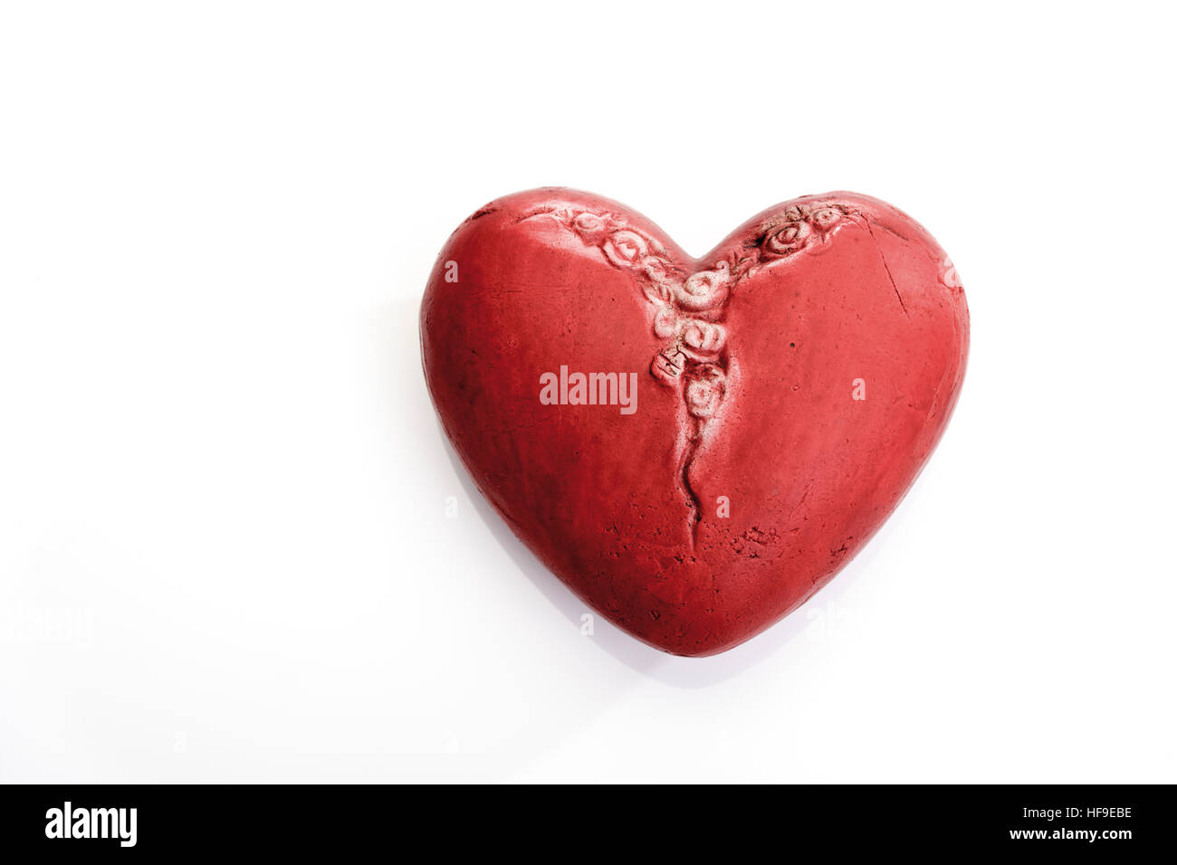 Cracked red heart Stock Photo - Alamy