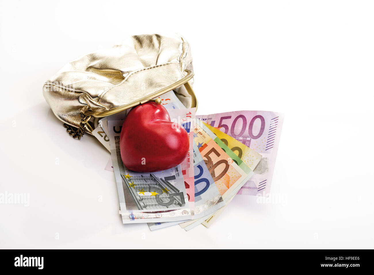 Wallet, cash and a heart: love for sale Stock Photo - Alamy