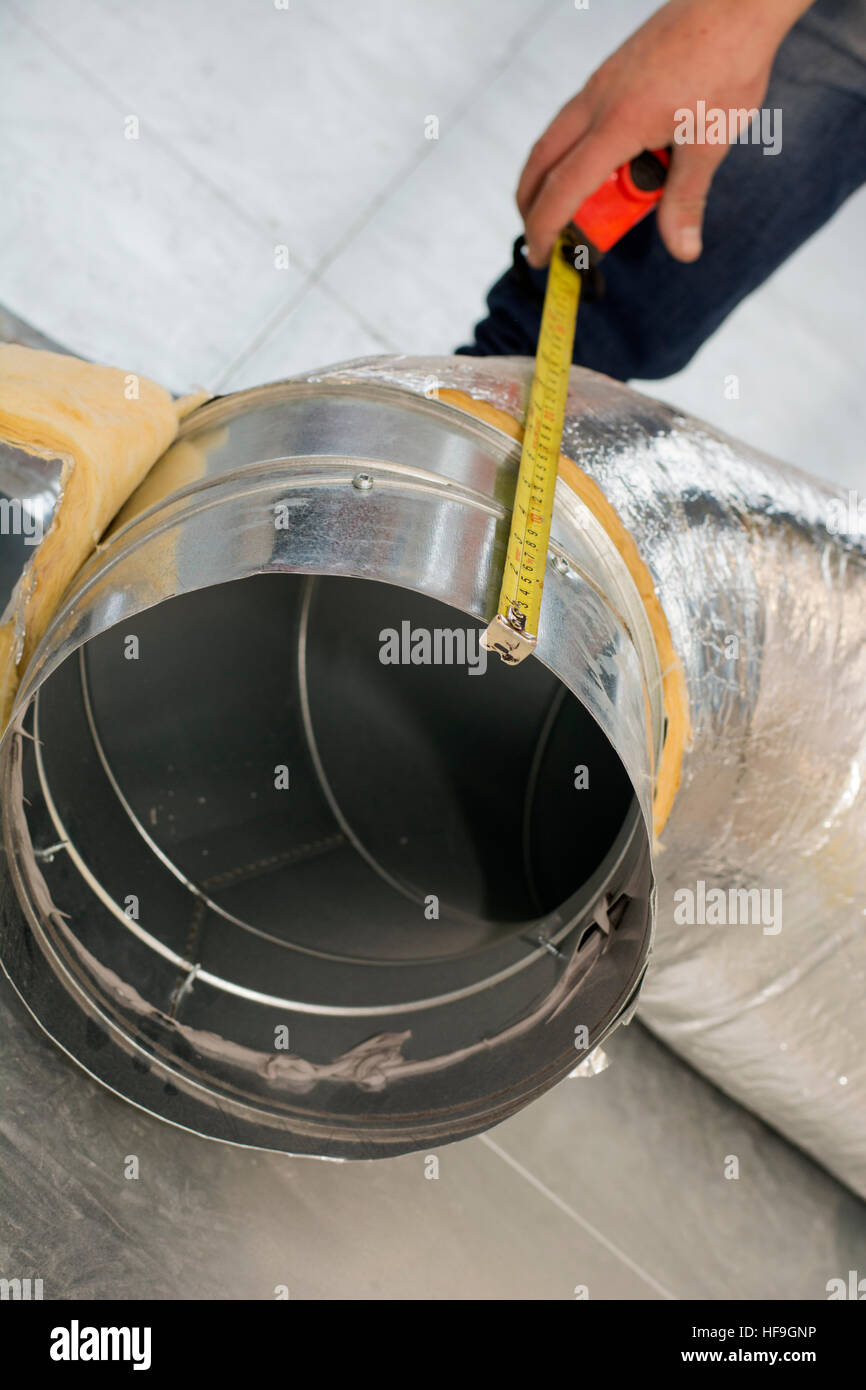 Measuring up prior to installation of air conditioning ductwork by ...