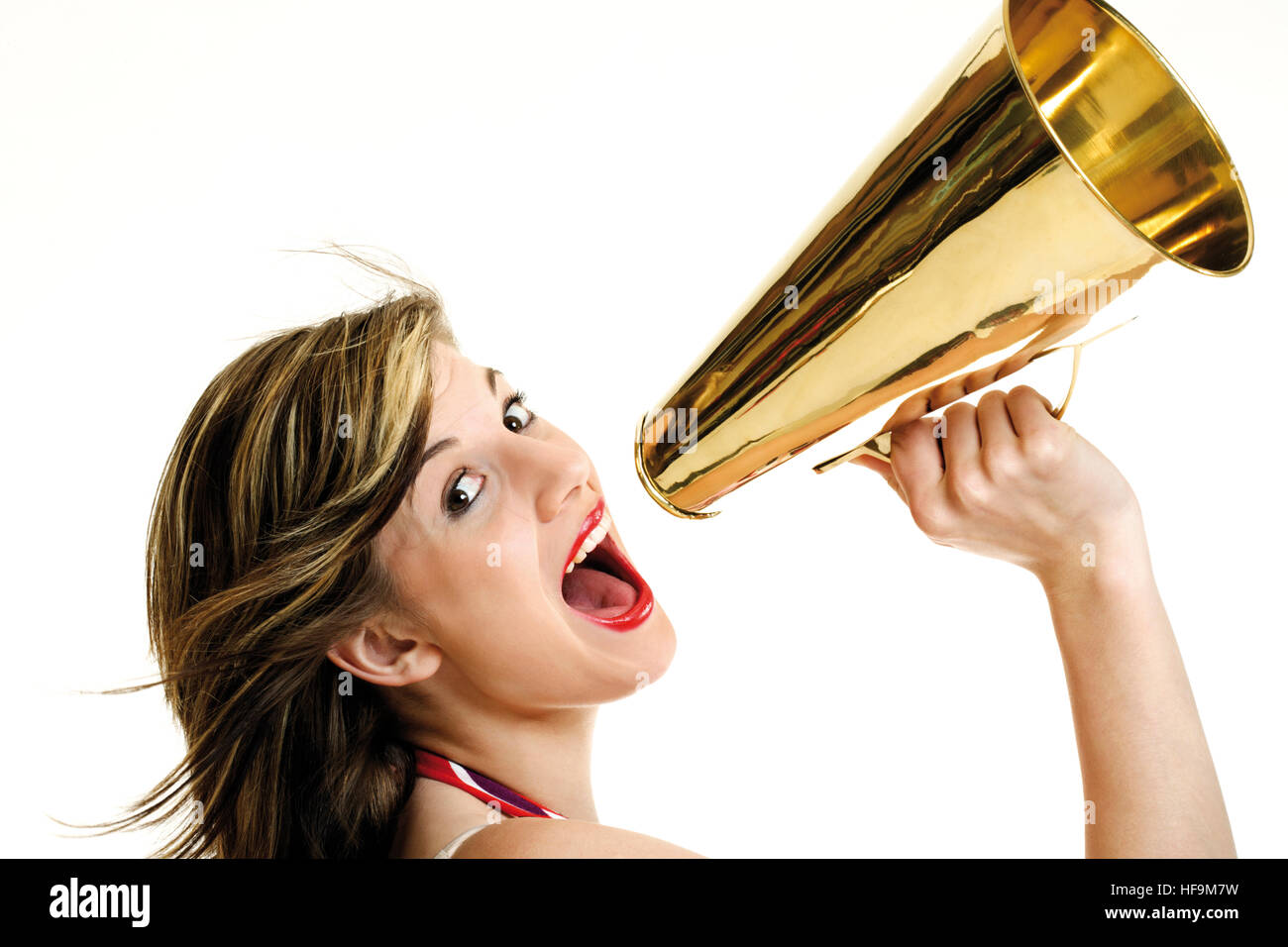 Young woman screaming through a megaphone Stock Photo - Alamy