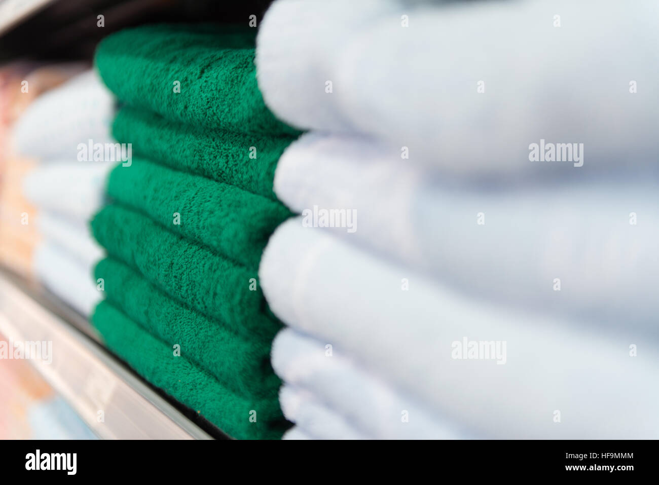 Big Shelf With a Colorful Stack Towels Stock Photo - Alamy