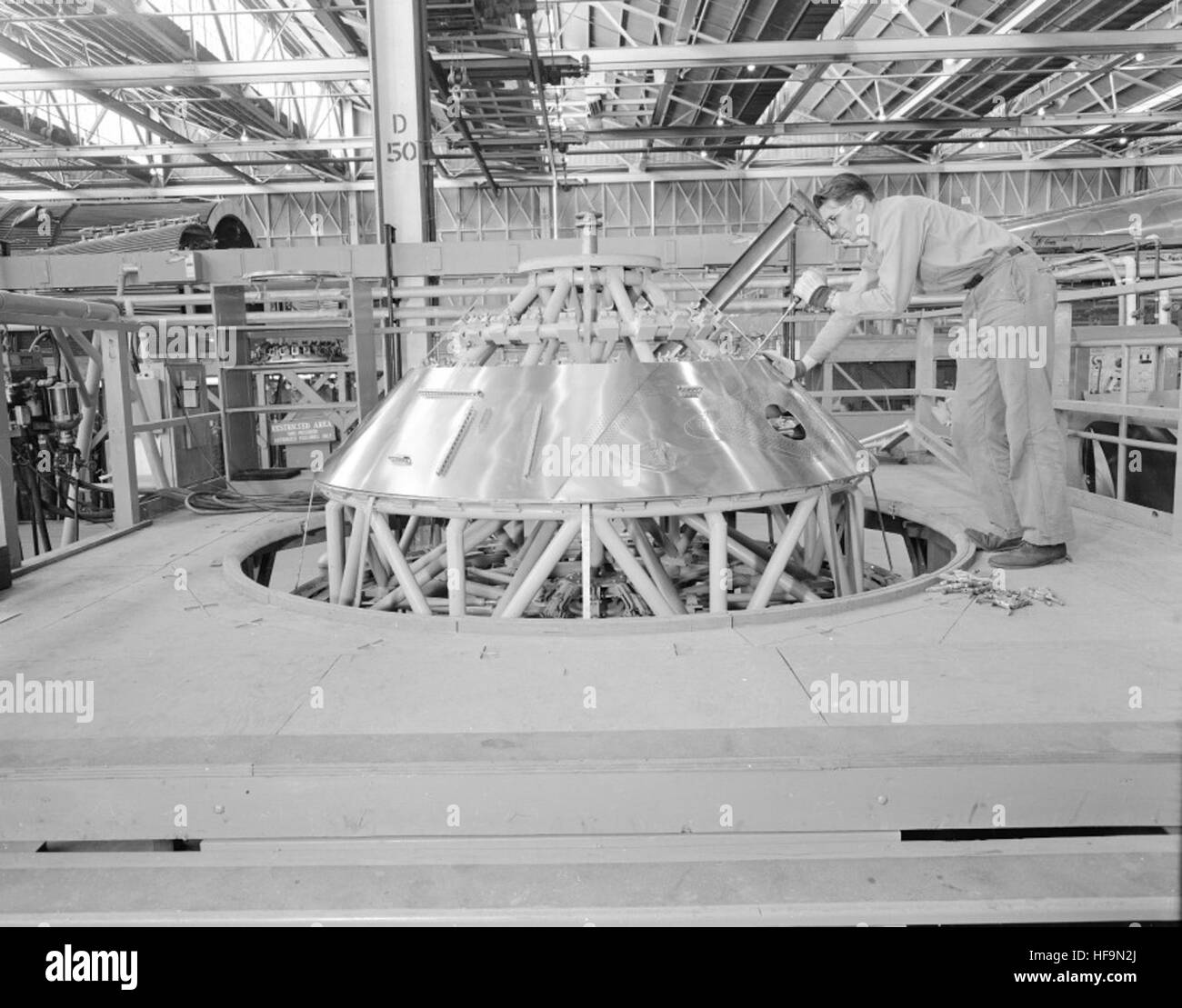 This photograph from the Atlas Collection shows engineers checking the ...