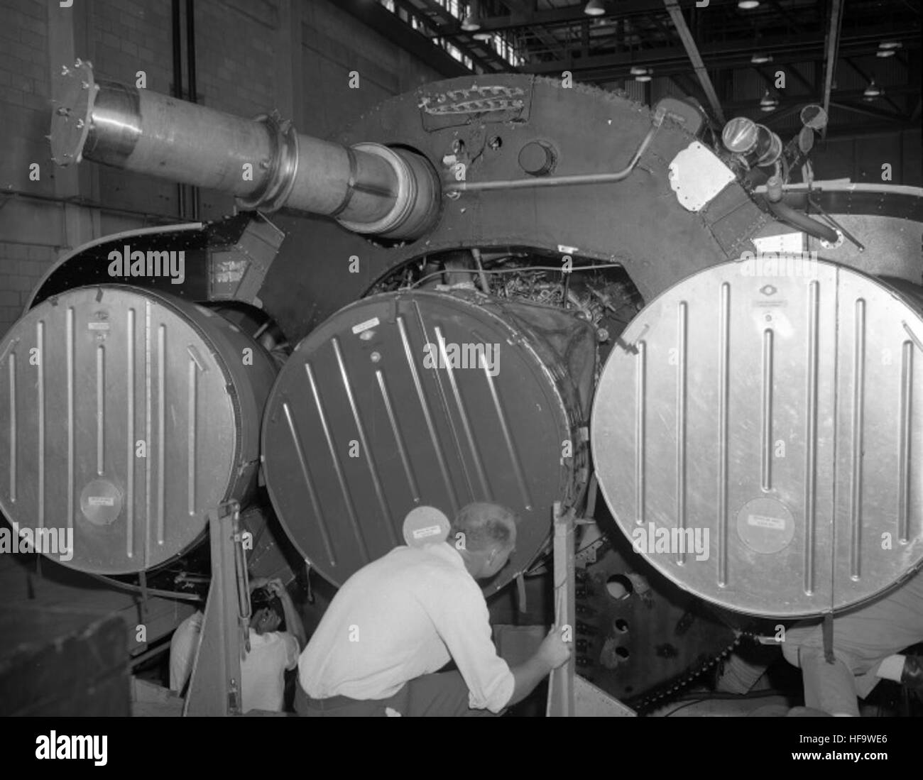 A photograph from the Atlas Collection depicting engineers performing ...