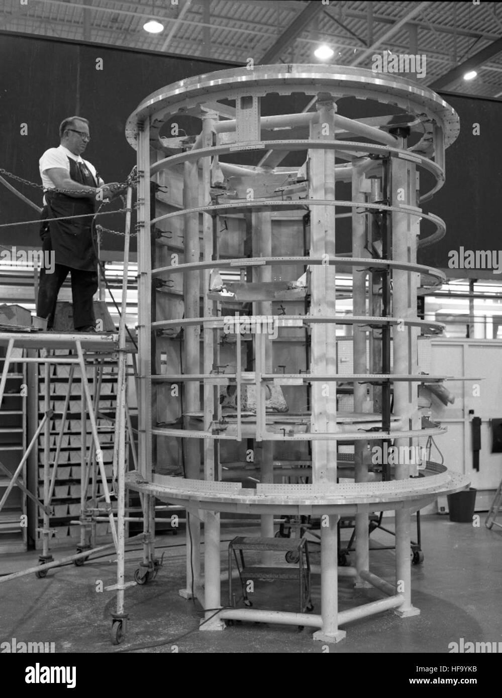 A photograph from the Atlas Collection showing a rocket being prepared ...