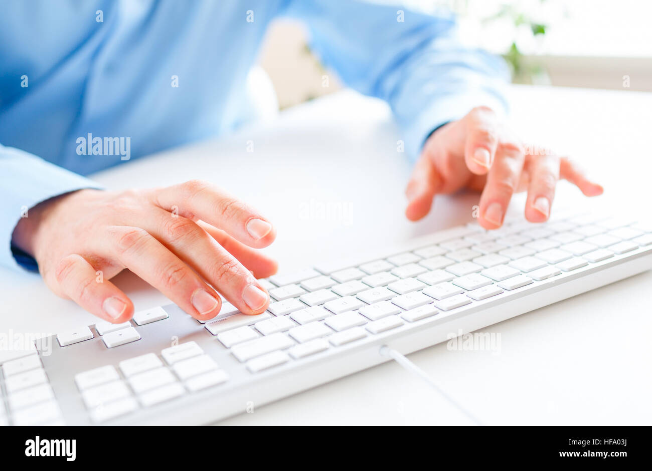 Male hands or men office worker typing on the keyboard Stock Photo - Alamy