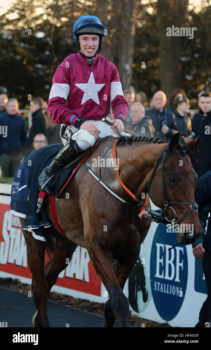 Outlander and jockey Jack Kennedy in the parade ring after winning The ...