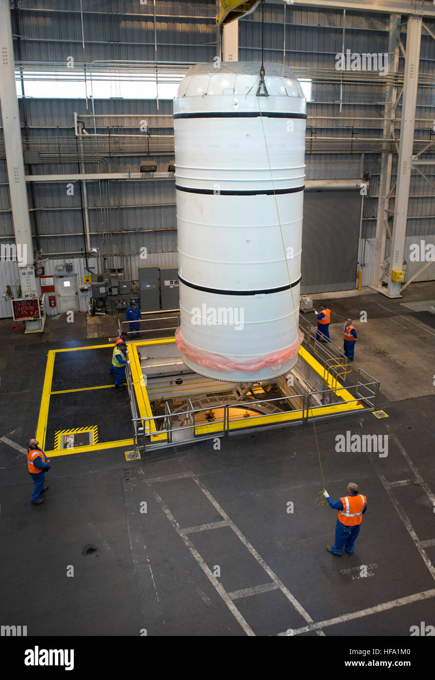 The booster segment for NASA's Space Launch System (SLS) undergoes ...