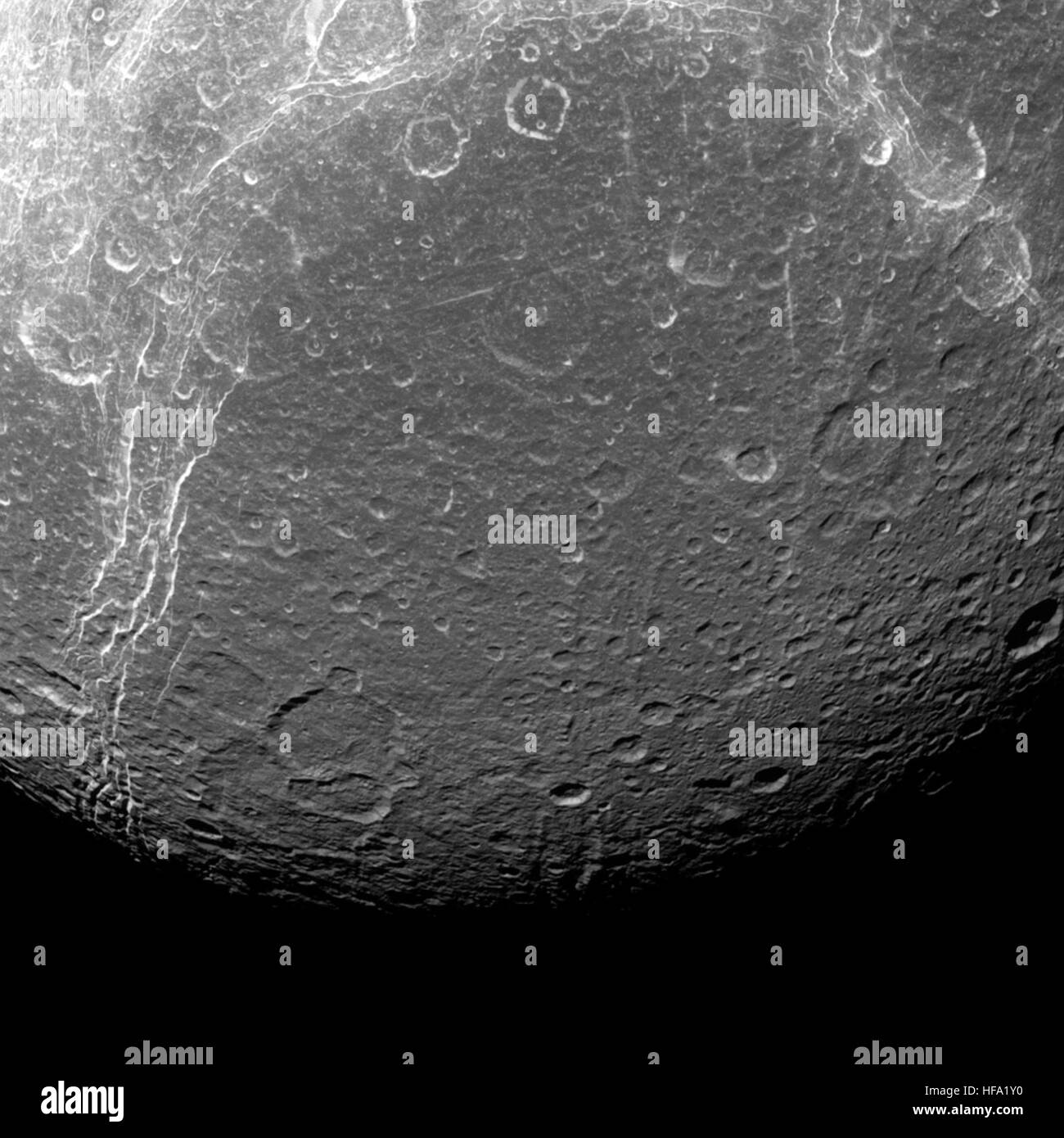 NASA's Cassini spacecraft captures an image contrasting Saturn's moons ...